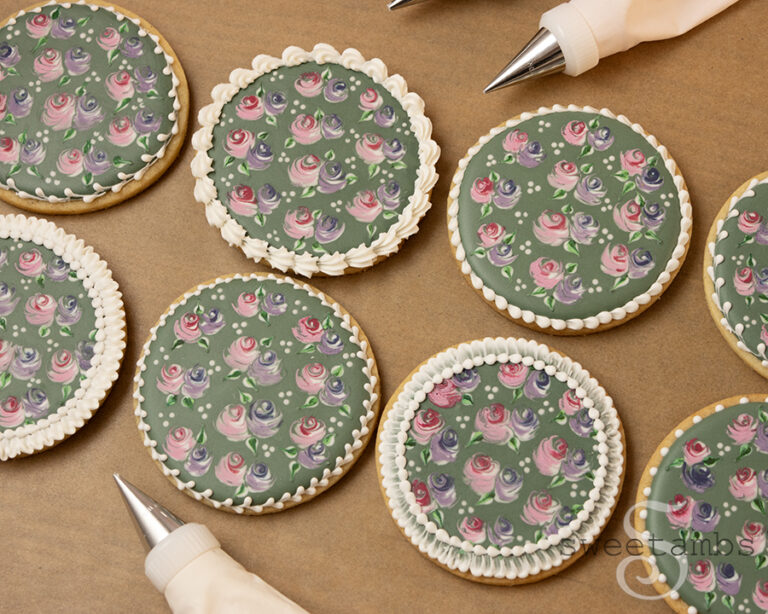 Learn How To Pipe Borders With Royal Icing - SweetAmbs